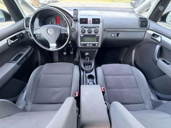 Black Volkswagen Touran 2007 in Vilnius, with an engine capacity of 1.97 L and mileage of 224 thousand km for 3700 €, photo 5 on AUTOMOTO.COM.LV