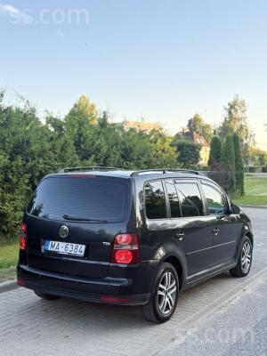 Melns Volkswagen Touran 2007 Kuldīga, ar dzinēja tilpumu 1.90 L un nobraukumu 388 tūkst. km par 2800 €, foto 4 vietnē AUTOMOTO.COM.LV