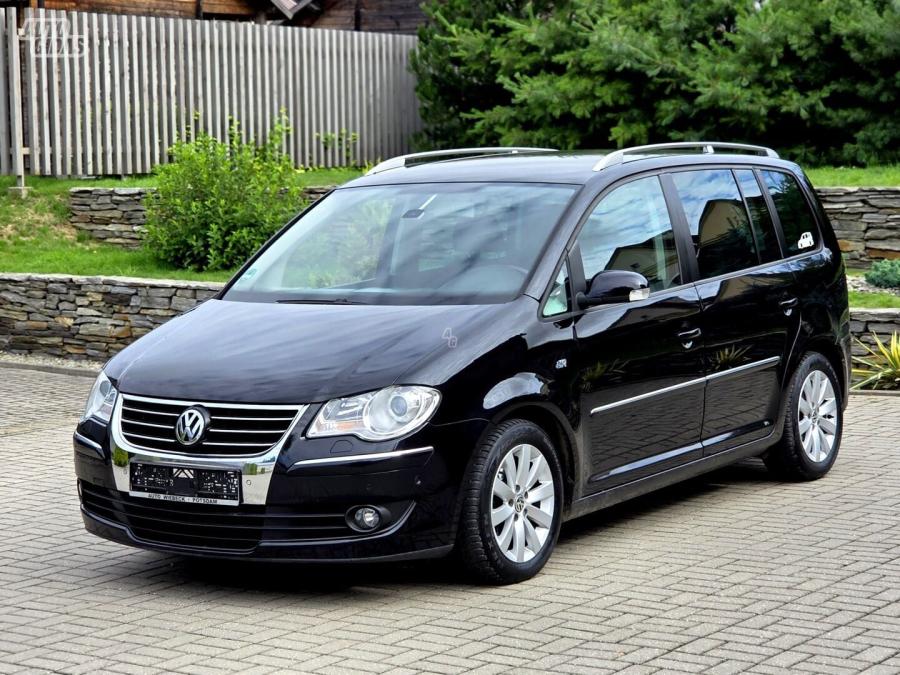 Black Volkswagen Touran 2007 in Vilnius, with an engine capacity of 2.00 L and mileage of 334 thousand km for 3200 €, photo 4 on AUTOMOTO.COM.LV