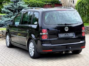 Black Volkswagen Touran 2007 in Vilnius, with an engine capacity of 2.00 L and mileage of 334 thousand km for 3200 €, photo 7 on AUTOMOTO.COM.LV