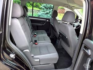 Black Volkswagen Touran 2007 in Vilnius, with an engine capacity of 2.00 L and mileage of 334 thousand km for 3200 €, photo 20 on AUTOMOTO.COM.LV