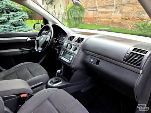 Black Volkswagen Touran 2007 in Vilnius, with an engine capacity of 2.00 L and mileage of 334 thousand km for 3200 €, photo 28 on AUTOMOTO.COM.LV