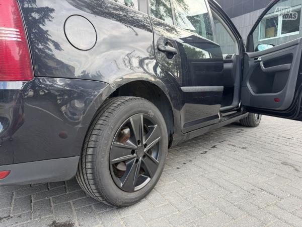 Melns Volkswagen Touran 2007 Panevēža, ar dzinēja tilpumu 1.90 L un nobraukumu 296 tūkst. km par 2150 €, foto 7 vietnē AUTOMOTO.COM.LV