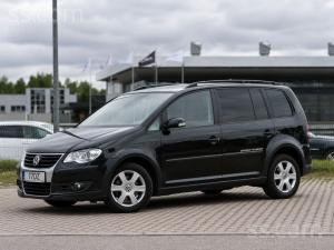 Black Volkswagen Touran 2007 in Riga, with an engine capacity of 1.40 L and mileage of 275 thousand km for 3950 €, photo  on AUTOMOTO.COM.LV
