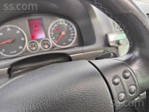 Black Volkswagen Touran 2007 in Riga, with an engine capacity of 2.00 L and mileage of 286 thousand km for 1988 €, photo 15 on AUTOMOTO.COM.LV