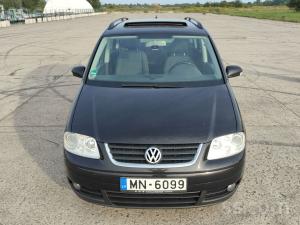 Black Volkswagen Touran 2007 in Riga, with an engine capacity of 2.00 L and mileage of 286 thousand km for 1988 €, photo  on AUTOMOTO.COM.LV