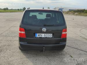 Black Volkswagen Touran 2007 in Riga, with an engine capacity of 2.00 L and mileage of 286 thousand km for 1988 €, photo 5 on AUTOMOTO.COM.LV