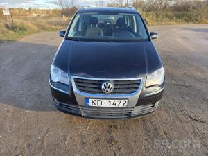 Melns Volkswagen Touran 2007 Liepāja, ar dzinēja tilpumu 2.00 L un nobraukumu 290 tūkst. km par 900 €, foto  vietnē AUTOMOTO.COM.LV