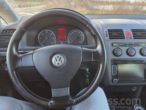 Black Volkswagen Touran 2007 in Liepaja, with an engine capacity of 2.00 L and mileage of 290 thousand km for 900 €, photo 9 on AUTOMOTO.COM.LV