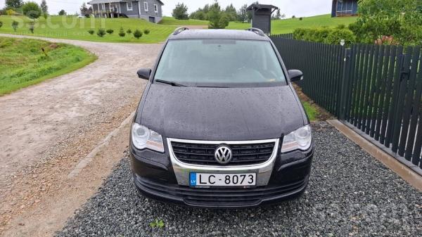 Black Volkswagen Touran 2007 in Riga, with an engine capacity of 2.00 L and mileage of 338 thousand km for 2680 €, photo 1 on AUTOMOTO.COM.LV
