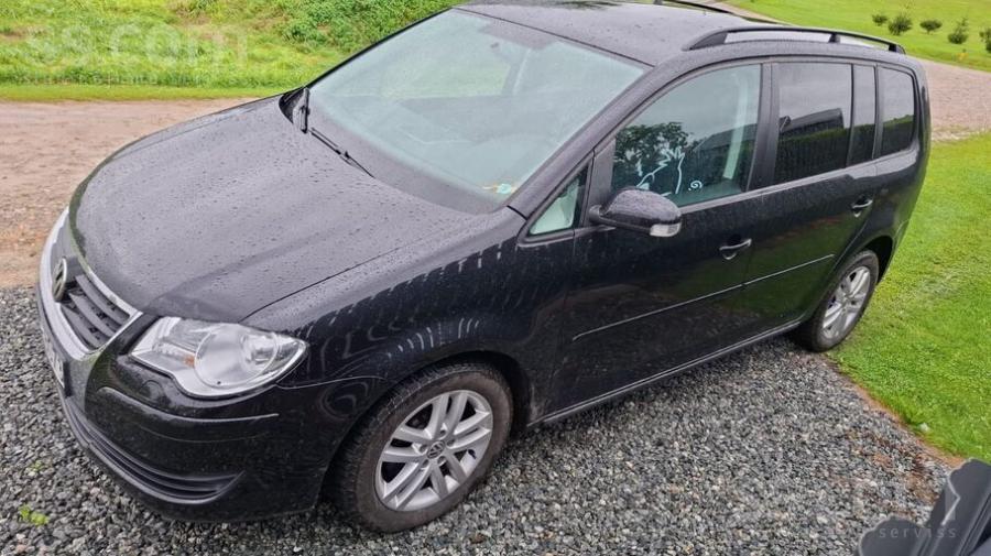 Melns Volkswagen Touran 2007 Rīga, ar dzinēja tilpumu 2.00 L un nobraukumu 338 tūkst. km par 2680 €, foto 4 vietnē AUTOMOTO.COM.LV