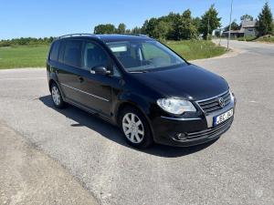 Black Volkswagen Touran 2007 in Klaipeda, with an engine capacity of 2.00 L and mileage of 220 thousand km for 3000 €, photo  on AUTOMOTO.COM.LV