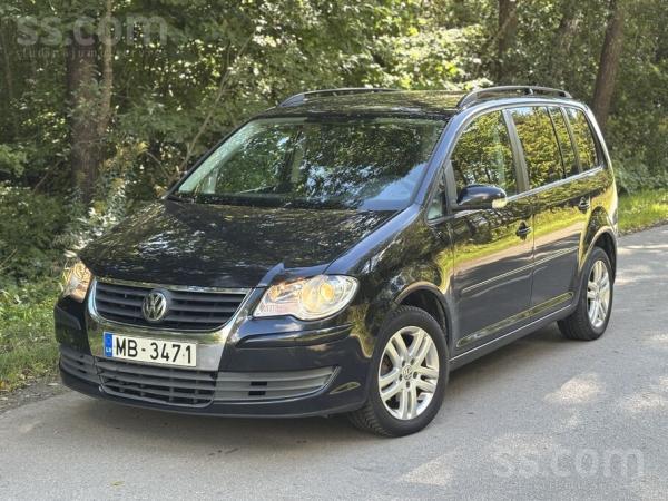 Melns Volkswagen Touran 2007 Rīga, ar dzinēja tilpumu 1.90 L un nobraukumu 242 tūkst. km par 3190 €, foto 1 vietnē AUTOMOTO.COM.LV