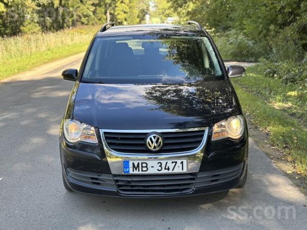 Melns Volkswagen Touran 2007 Rīga, ar dzinēja tilpumu 1.90 L un nobraukumu 242 tūkst. km par 3190 €, foto 6 vietnē AUTOMOTO.COM.LV