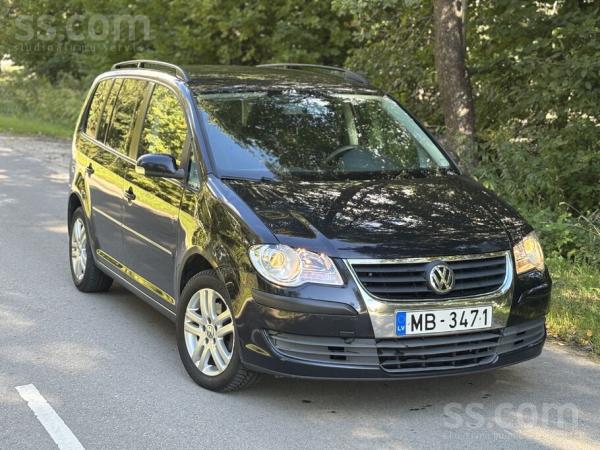 Фольксваген Туран 2007 в Рига на AUTOMOTO.COM.LV Черный Фольксваген Туран 2007 в Рига, объемом двигателя 1.90 л и пробегом 242 тыс. км за 3190 €, фото 6 на AUTOMOTO.COM.LV