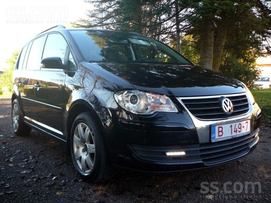 Black Volkswagen Touran 2007 in Cesis, with an engine capacity of 1.90 L and mileage of 0 thousand km for 2790 €, photo 1 on AUTOMOTO.COM.LV