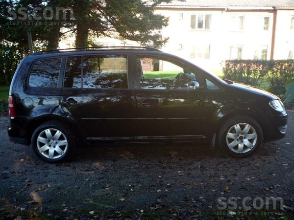 Volkswagen Touran 2007 Cēsis vietnē Melns Volkswagen Touran 2007 Cēsis, ar dzinēja tilpumu 1.90 L un nobraukumu 0 tūkst. km par 2790 €, foto 8 vietnē AUTOMOTO.COM.LV