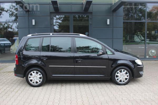 Volkswagen Touran 2007 Dobele vietnē Melns Volkswagen Touran 2007 Dobele, ar dzinēja tilpumu 2.00 L un nobraukumu 251 tūkst. km par 4300 €, foto 7 vietnē AUTOMOTO.COM.LV