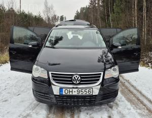 Black Volkswagen Touran 2008 in Jelgava, with an engine capacity of 1.40 L and mileage of 221 thousand km for 3590 €, photo 3 on AUTOMOTO.COM.LV