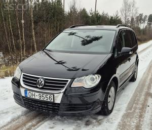 Black Volkswagen Touran 2008 in Jelgava, with an engine capacity of 1.40 L and mileage of 221 thousand km for 3590 €, photo 4 on AUTOMOTO.COM.LV