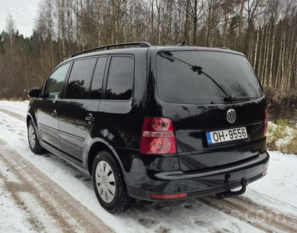 Melns Volkswagen Touran 2008 Jelgava, ar dzinēja tilpumu 1.40 L un nobraukumu 221 tūkst. km par 3590 €, foto 6 vietnē AUTOMOTO.COM.LV