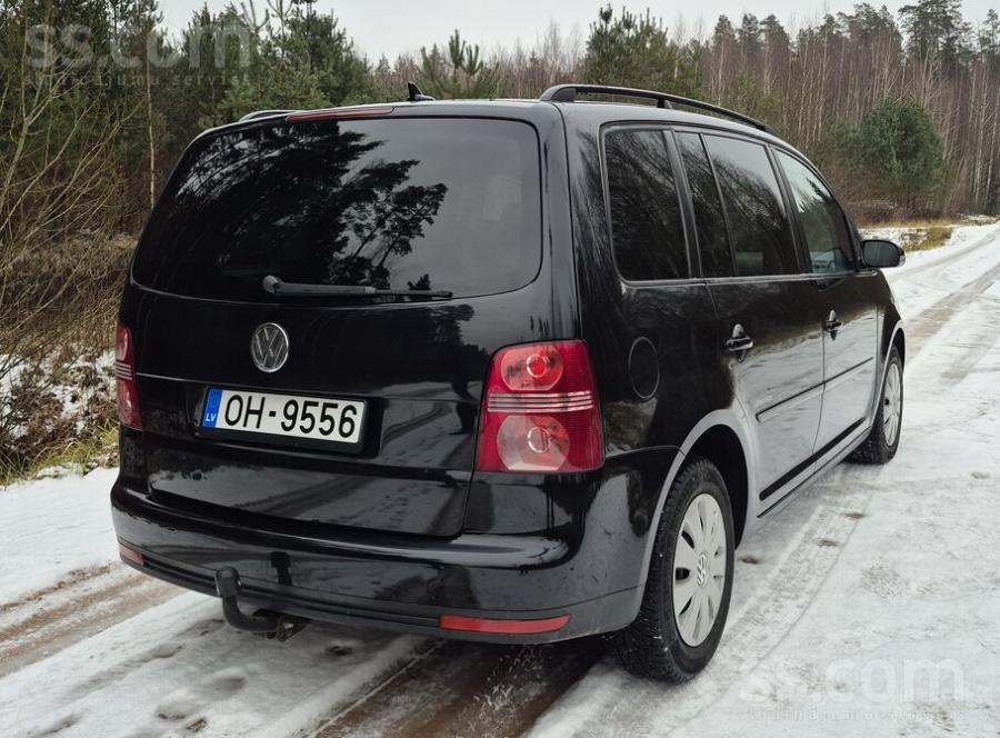 Black Volkswagen Touran 2008 in Jelgava, with an engine capacity of 1.40 L and mileage of 221 thousand km for 3590 €, photo 7 on AUTOMOTO.COM.LV