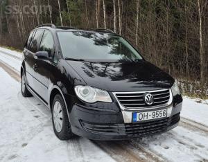 Black Volkswagen Touran 2008 in Jelgava, with an engine capacity of 1.40 L and mileage of 221 thousand km for 3590 €, photo 8 on AUTOMOTO.COM.LV