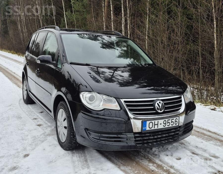 Black Volkswagen Touran 2008 in Jelgava, with an engine capacity of 1.40 L and mileage of 221 thousand km for 3590 €, photo 8 on AUTOMOTO.COM.LV