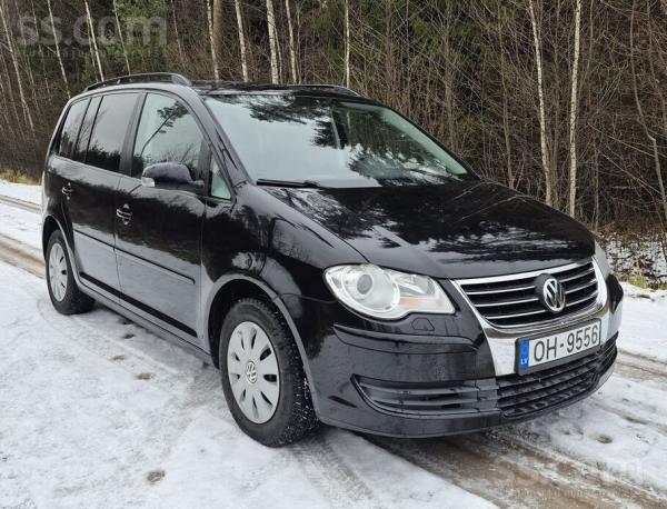 Melns Volkswagen Touran 2008 Jelgava, ar dzinēja tilpumu 1.40 L un nobraukumu 221 tūkst. km par 3590 €, foto 9 vietnē AUTOMOTO.COM.LV