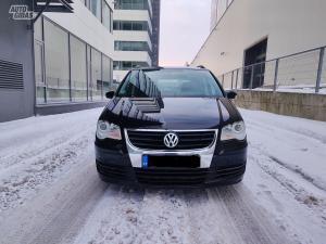 Black Volkswagen Touran 2008 in Vilnius, with an engine capacity of 2.00 L and mileage of 302 thousand km for 2450 €, photo  on AUTOMOTO.COM.LV
