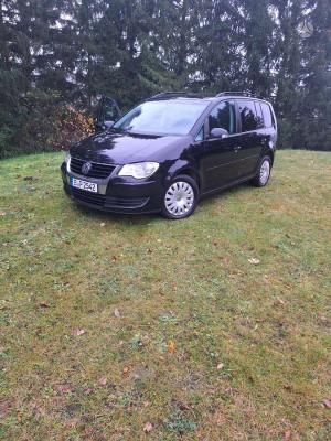 Black Volkswagen Touran 2008 in Silute, with an engine capacity of 2.00 L and mileage of 286 thousand km for 3750 €, photo  on AUTOMOTO.COM.LV