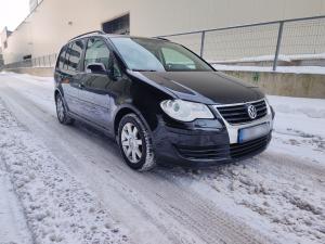 Black Volkswagen Touran 2008 in Vilnius, with an engine capacity of 2.00 L and mileage of 301 thousand km for 2400 €, photo  on AUTOMOTO.COM.LV