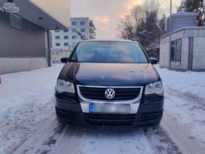 Black Volkswagen Touran 2008 in Vilnius, with an engine capacity of 2.00 L and mileage of 301 thousand km for 2400 €, photo  on AUTOMOTO.COM.LV