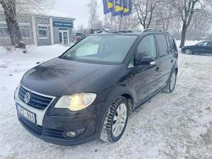 Melns Volkswagen Touran 2008 Jonava, ar dzinēja tilpumu 1.97 L un nobraukumu 295 tūkst. km par 3600 €, foto  vietnē AUTOMOTO.COM.LV