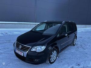 Black Volkswagen Touran 2008 in Siauliai, with an engine capacity of 1.90 L and mileage of 327 thousand km for 2690 €, photo 5 on AUTOMOTO.COM.LV