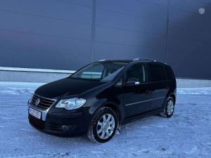 Black Volkswagen Touran 2008 in Siauliai, with an engine capacity of 1.90 L and mileage of 327 thousand km for 2690 €, photo 7 on AUTOMOTO.COM.LV