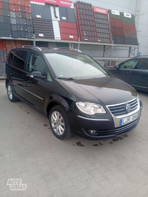 Black Volkswagen Touran 2008 in Vilnius, with an engine capacity of 2.00 L and mileage of 343 thousand km for 2800 €, photo 3 on AUTOMOTO.COM.LV