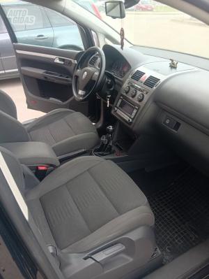Black Volkswagen Touran 2008 in Vilnius, with an engine capacity of 2.00 L and mileage of 343 thousand km for 2800 €, photo 8 on AUTOMOTO.COM.LV