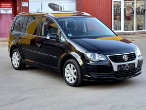 Black Volkswagen Touran 2008 in Vilnius, with an engine capacity of 2.00 L and mileage of 282 thousand km for 3400 €, photo 14 on AUTOMOTO.COM.LV