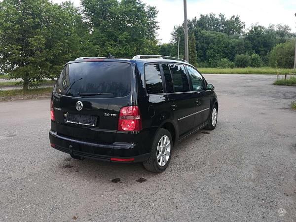 Black Volkswagen Touran 2008 in Ukmerge, with an engine capacity of 1.97 L and mileage of 287 thousand km for 3650 €, photo 6 on AUTOMOTO.COM.LV