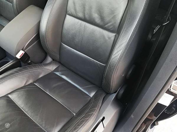 Black Volkswagen Touran 2008 in Ukmerge, with an engine capacity of 1.97 L and mileage of 287 thousand km for 3650 €, photo 10 on AUTOMOTO.COM.LV