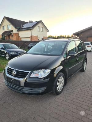 Melns Volkswagen Touran 2008 Kaišiadorys, ar dzinēja tilpumu 1.90 L un nobraukumu 266 tūkst. km par 2999 €, foto 4 vietnē AUTOMOTO.COM.LV
