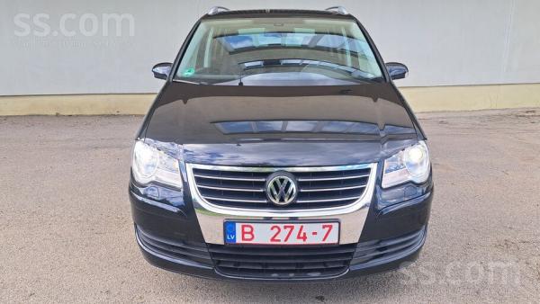 Melns Volkswagen Touran 2008 Ogre, ar dzinēja tilpumu 1.40 L un nobraukumu 238 tūkst. km par 3950 €, foto 3 vietnē AUTOMOTO.COM.LV