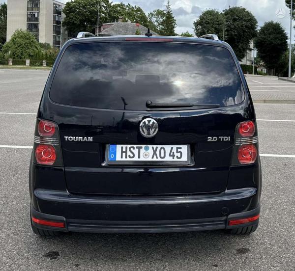 Black Volkswagen Touran 2008 in Telschi, with an engine capacity of 2.00 L and mileage of 207 thousand km for 4950 €, photo 6 on AUTOMOTO.COM.LV