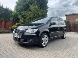 Black Volkswagen Touran 2008 in Marijampole, with an engine capacity of 1.97 L and mileage of 232 thousand km for 4900 €, photo  on AUTOMOTO.COM.LV