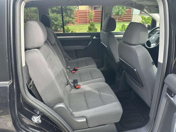 Black Volkswagen Touran 2008 in Marijampole, with an engine capacity of 1.97 L and mileage of 232 thousand km for 4900 €, photo 8 on AUTOMOTO.COM.LV