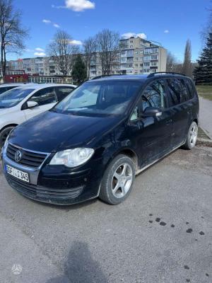 Black Volkswagen Touran 2008 in Klaipeda, with an engine capacity of 1.40 L and mileage of 414 thousand km for 1800 €, photo  on AUTOMOTO.COM.LV