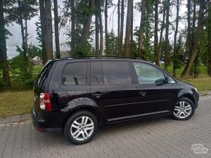 Melns Volkswagen Touran 2008 Kauņa, ar dzinēja tilpumu 2.00 L un nobraukumu 272 tūkst. km par 3250 €, foto 11 vietnē AUTOMOTO.COM.LV