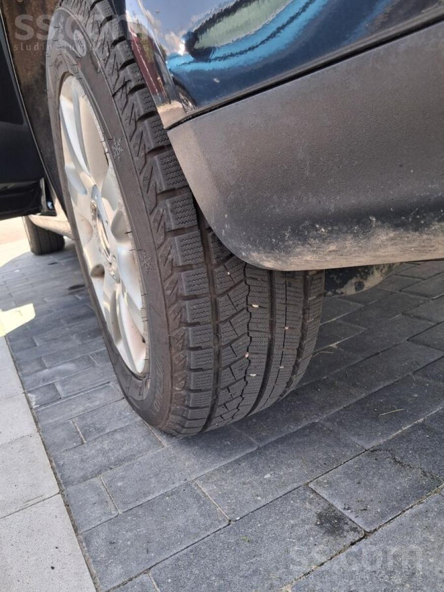 Melns Volkswagen Touran 2008 Jelgava, ar dzinēja tilpumu 2.00 L un nobraukumu 324 tūkst. km par 2400 €, foto 13 vietnē AUTOMOTO.COM.LV