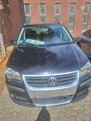 Black Volkswagen Touran 2008 in Jurbarkas, with an engine capacity of 1.97 L and mileage of 220 thousand km for 2999 €, photo 6 on AUTOMOTO.COM.LV